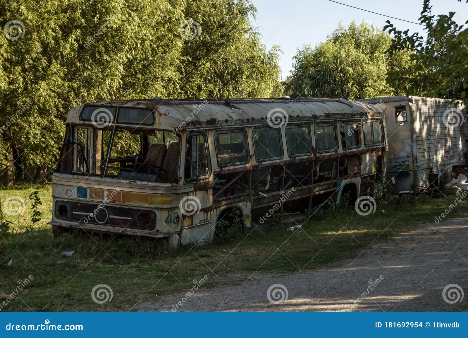 Broken-down rusted bus stock photo. Image of land, gravel - 181692954