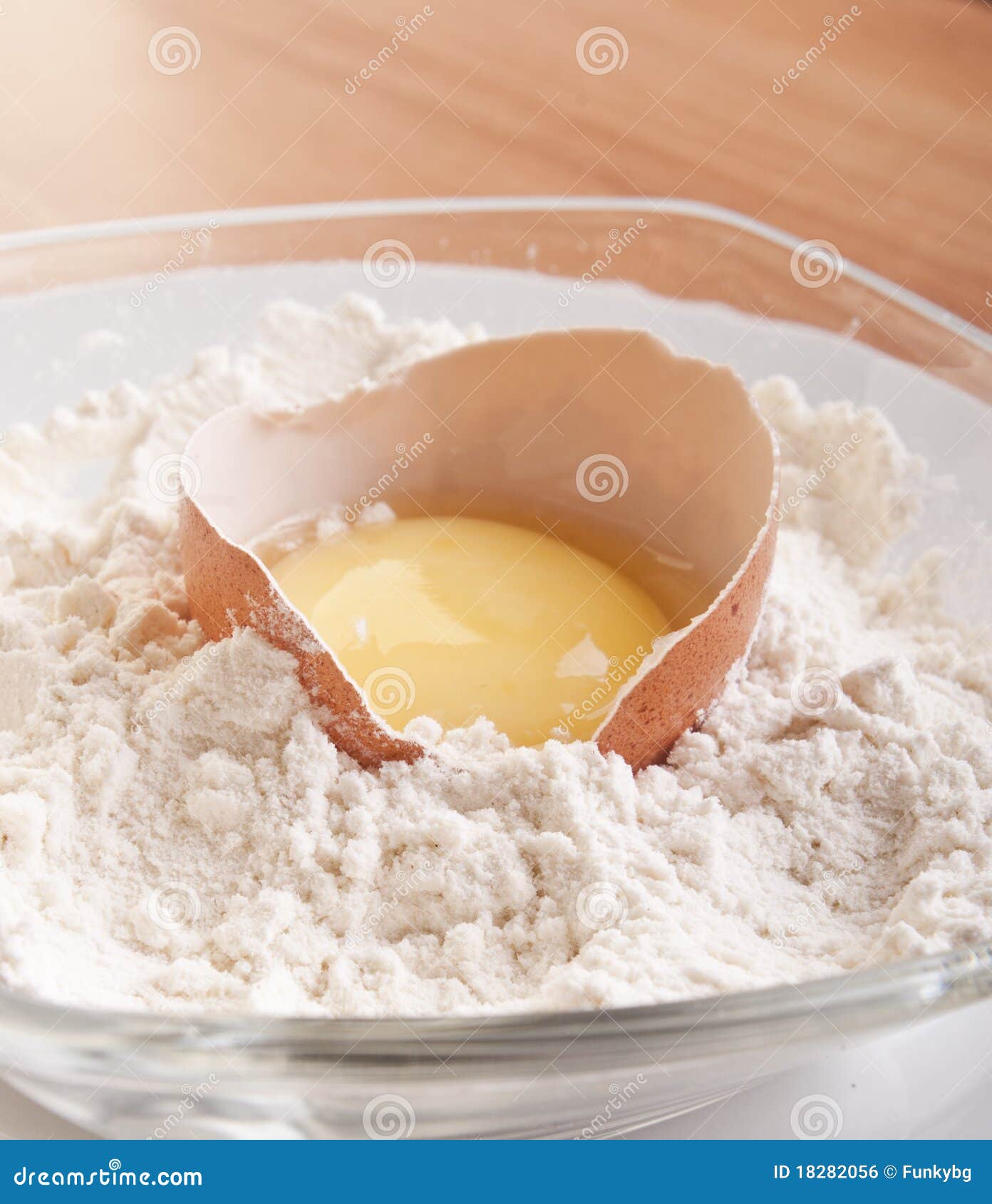 Broken Egg with Shell on Flour Stock Photo - Image of healthy, yellow ...