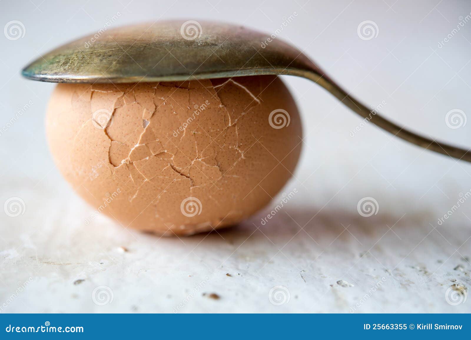 Broken egg on white table stock image. Image of damaged - 25663355