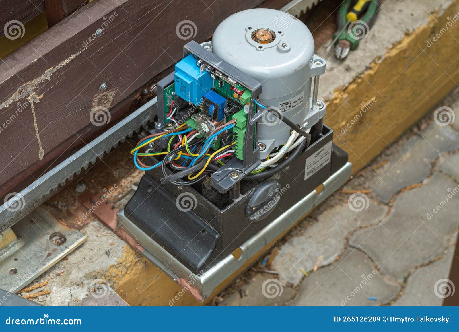 Broken Electric Motor Engine of Gate with Gate Rack Rail. Editorial ...