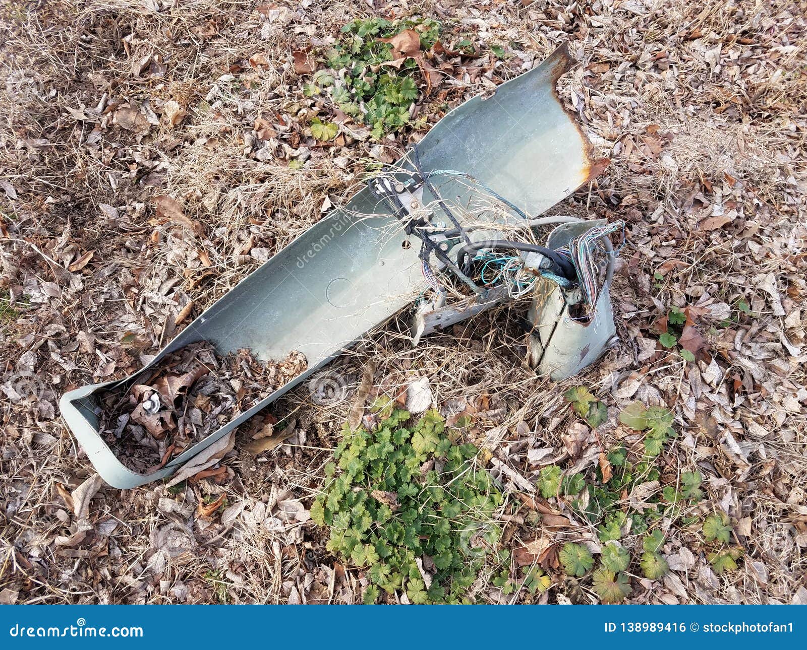 Broken Electrical Box on Ground with Wires and Leaves Stock Photo ...