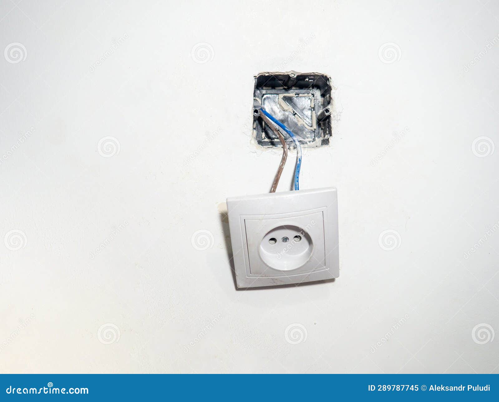 Broken Electrical Socket on the Wall. Disassembled Device. White Wall ...