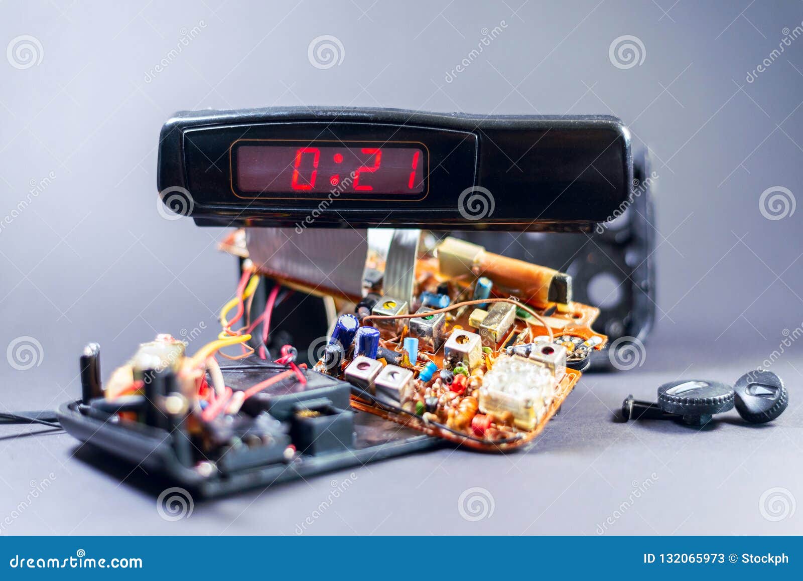 Broken Electronic Clock Shows Time. the Details of the Board ...