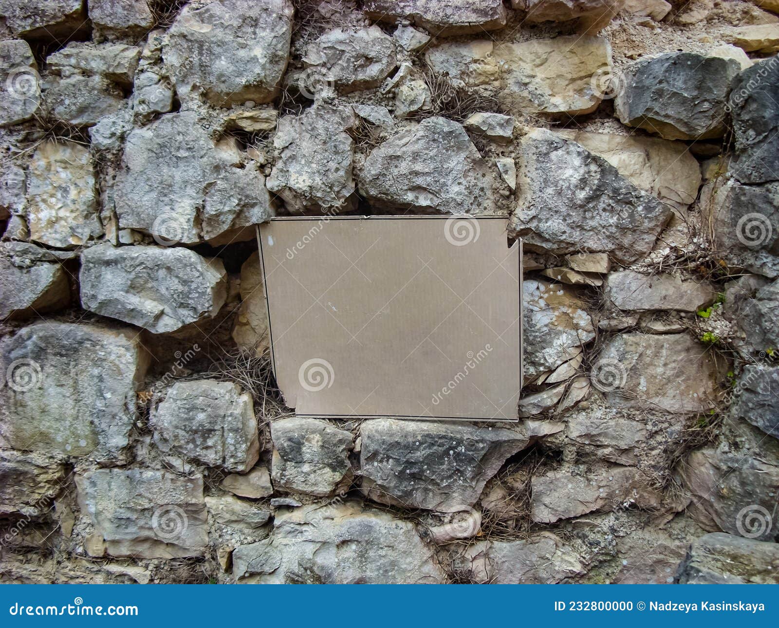 Broken Empty Tablet on a Background of Ancient Stone Bricks Stock Photo ...