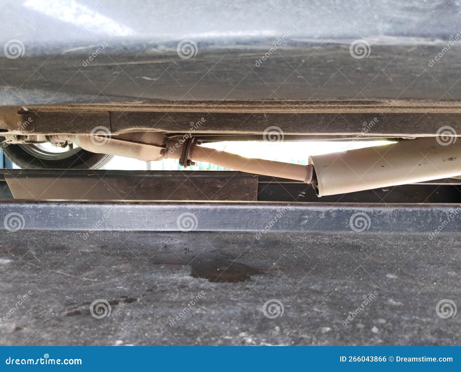 Broken exhaust car stock photo. Image of exhaust, broken - 266043866