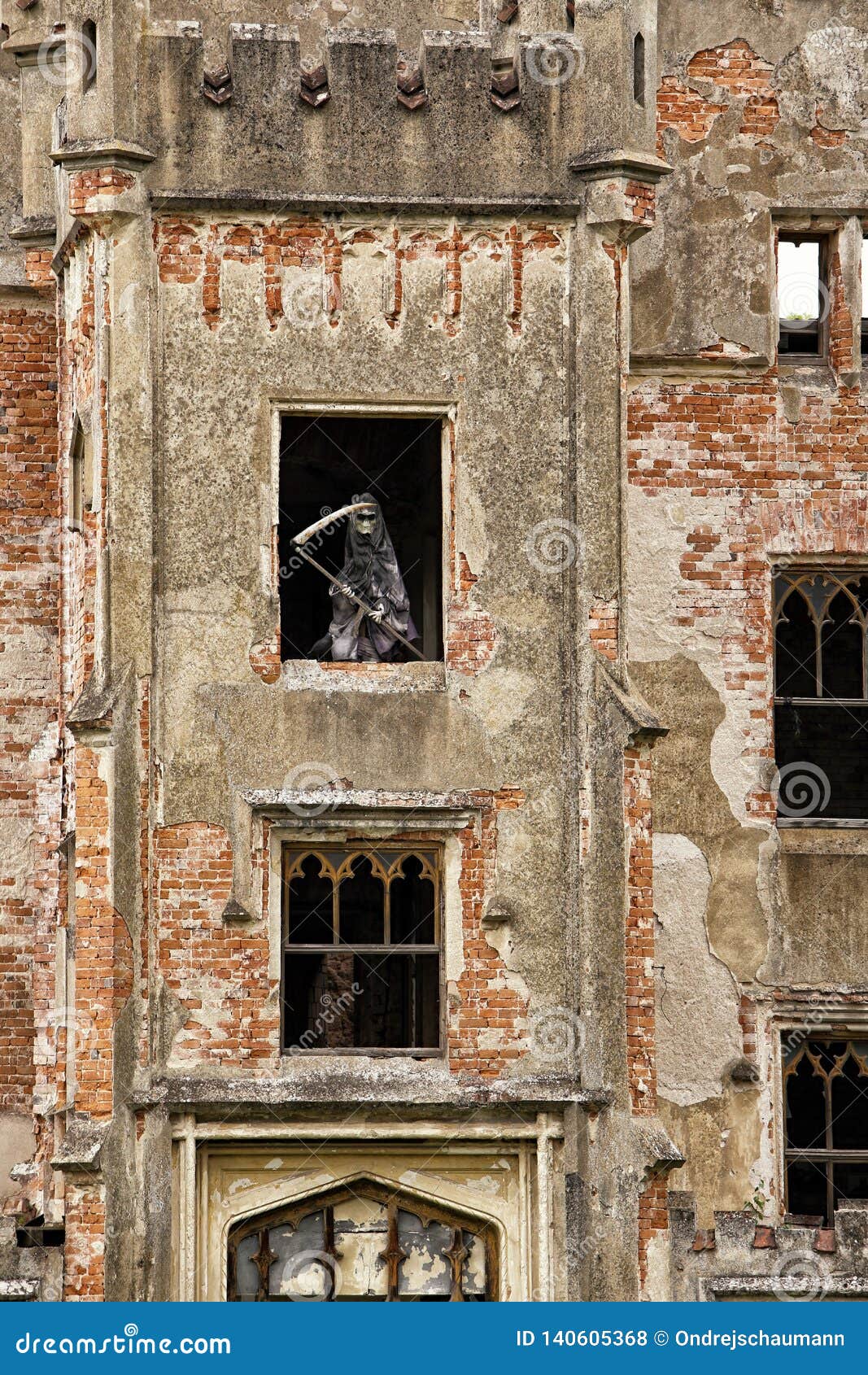 Broken Facade of the Old Castle with Statue of Death Editorial Stock ...
