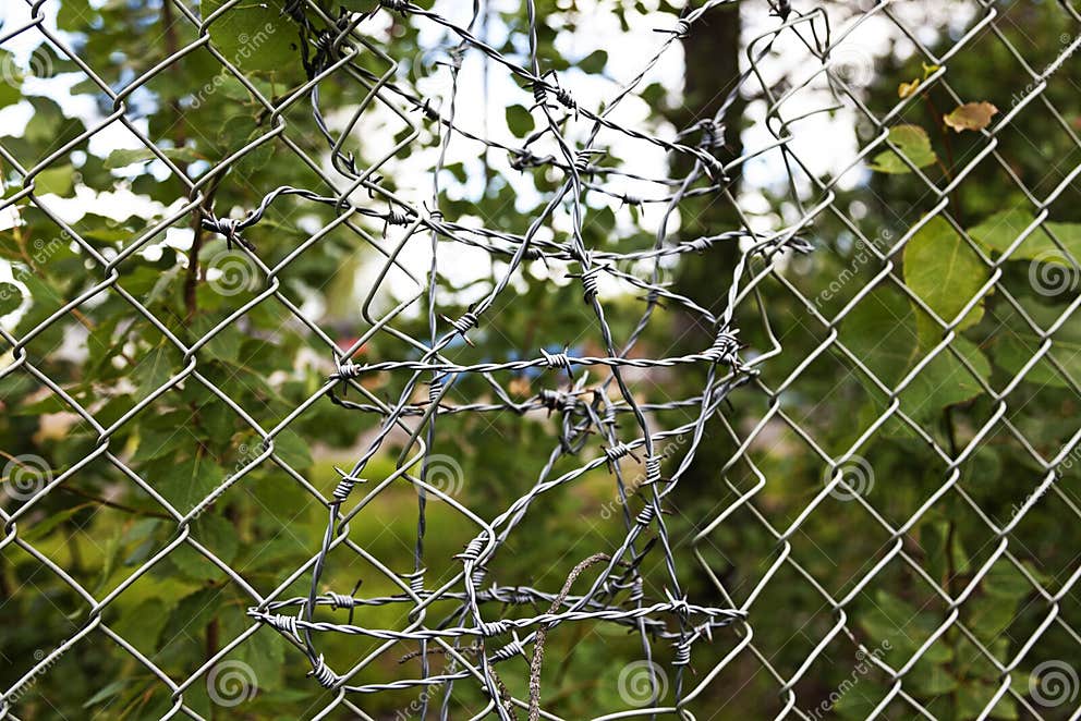 Broken Fence Mended with Barbed Wire Stock Photo - Image of torn, umea ...