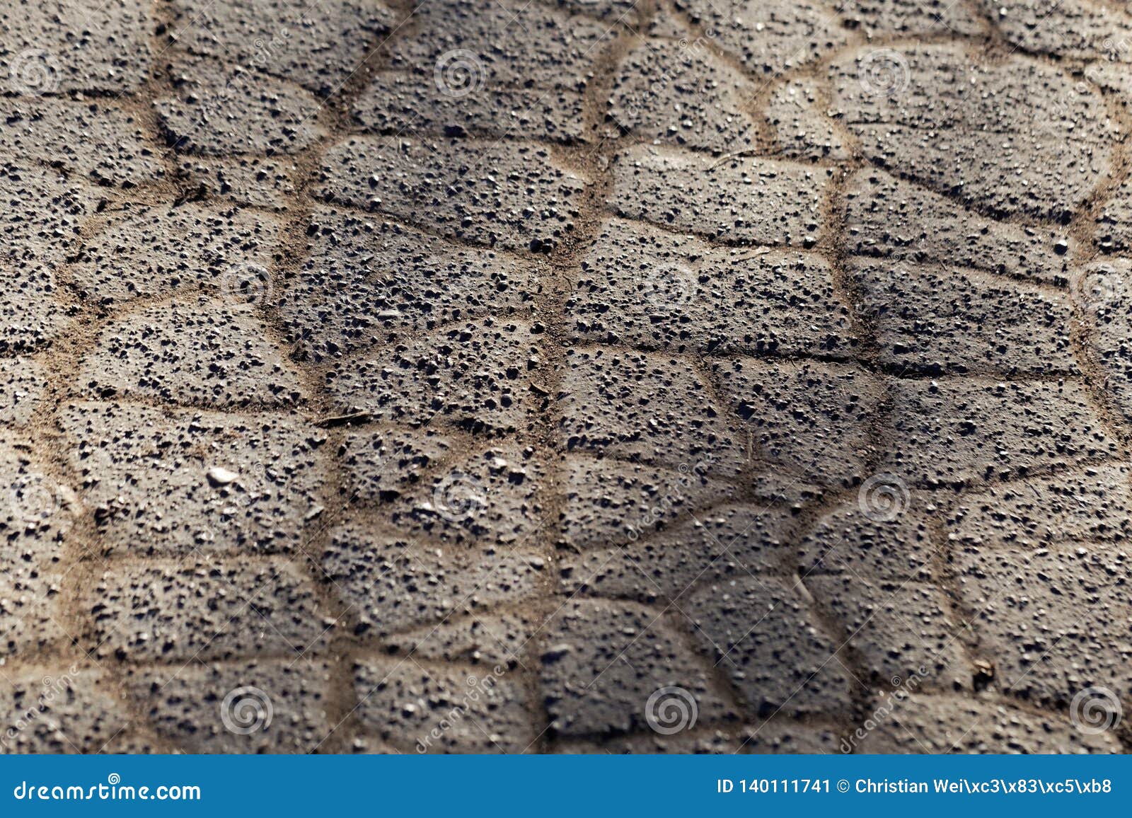Broken pavement of a road stock image. Image of concrete - 140111741