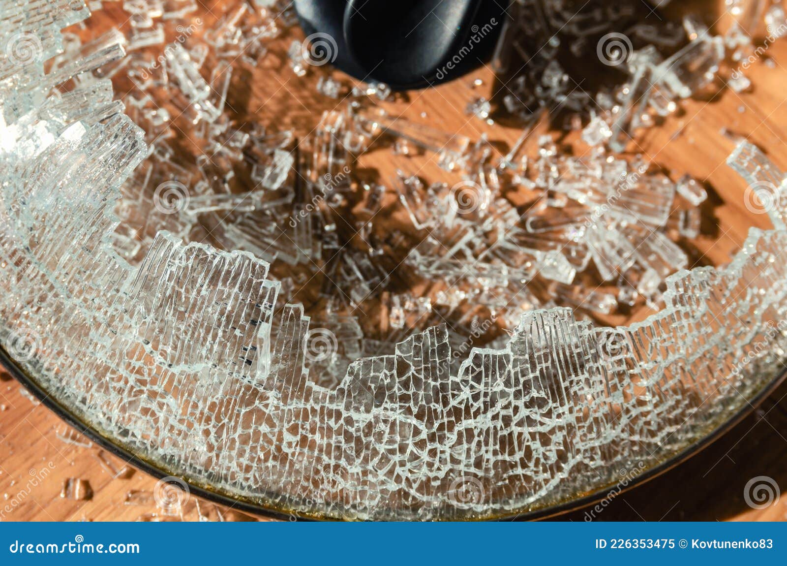 Broken Frying Pan Lid Falling To the Floor. Stock Image - Image of ...