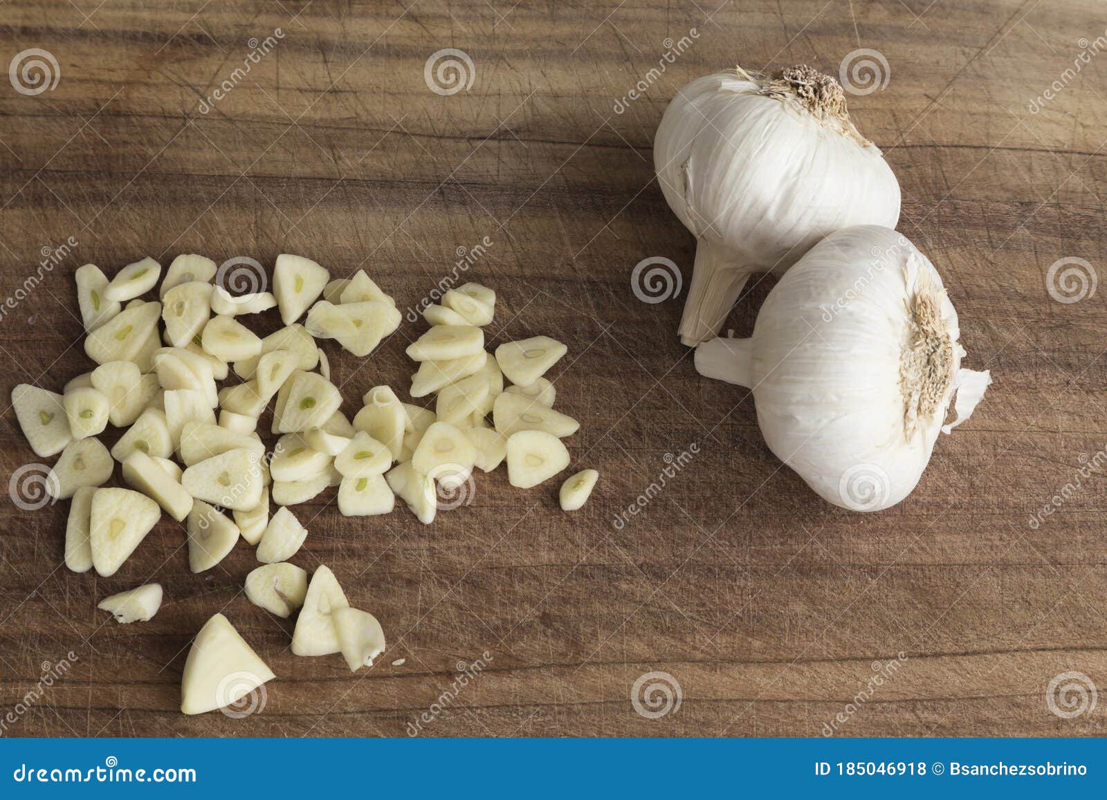 Split Garlic on Kitchen Board Stock Photo - Image of garlic, horizontal ...