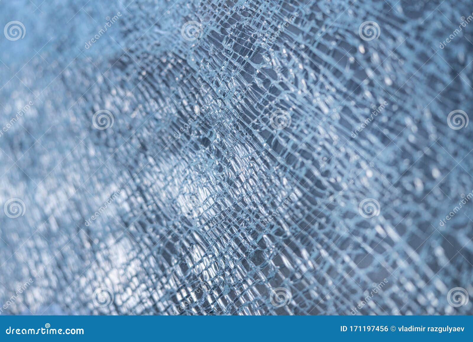 Broken Glass Background. a Glass Window Cracked with Cobwebs ...