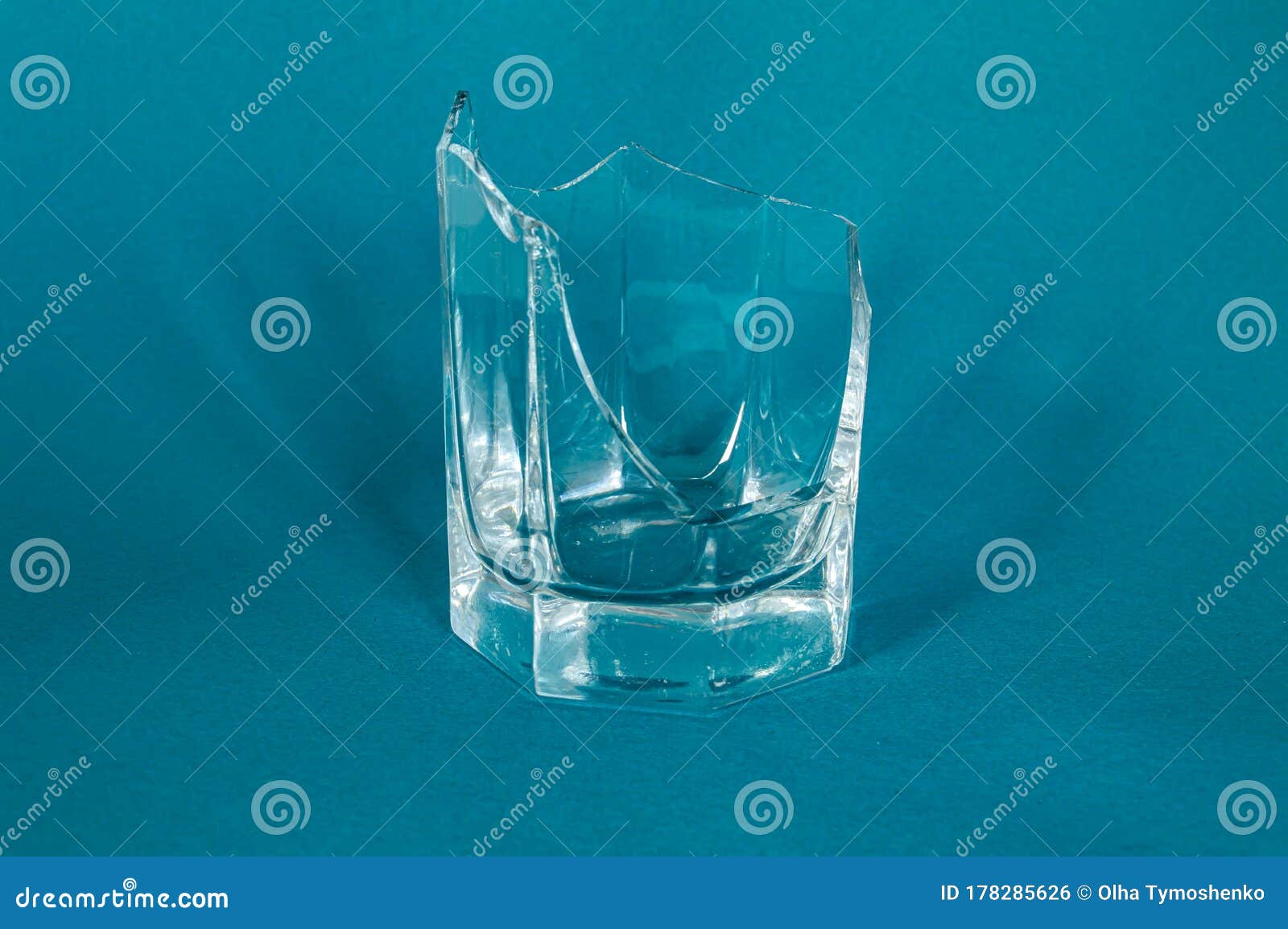 Broken Glass Glass on a Blue Background Close Up Stock Photo - Image of ...
