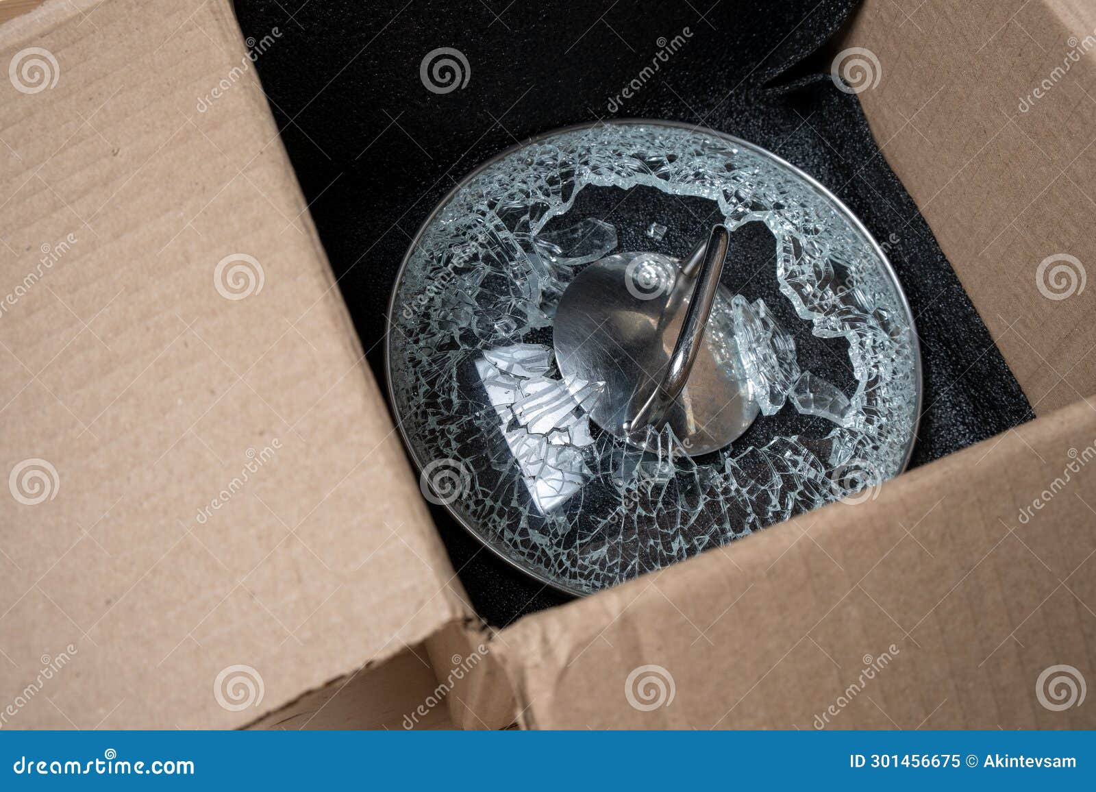 Broken Glass Lid in an Open Cardboard Box with Bubble Wrap Stock Image ...