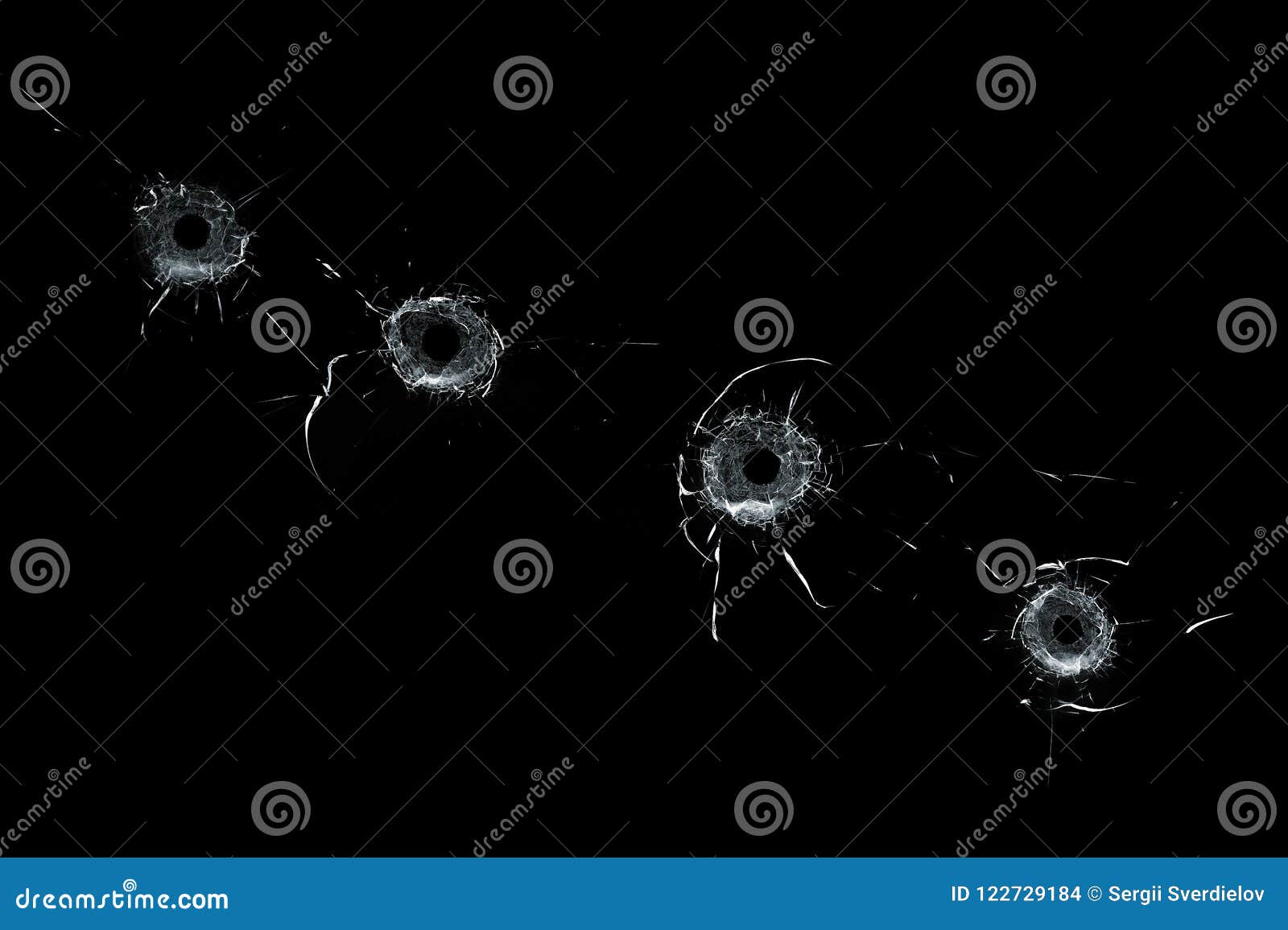 Multiple Bullet Holes In Glass