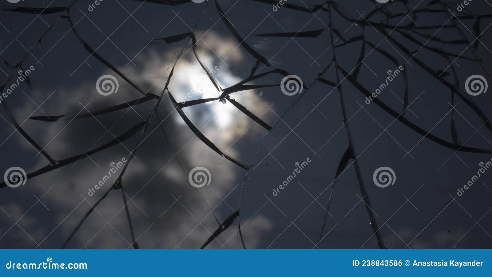 Broken Glass Over Sky and Sun Behind the Cloud Background. Stock Photo ...