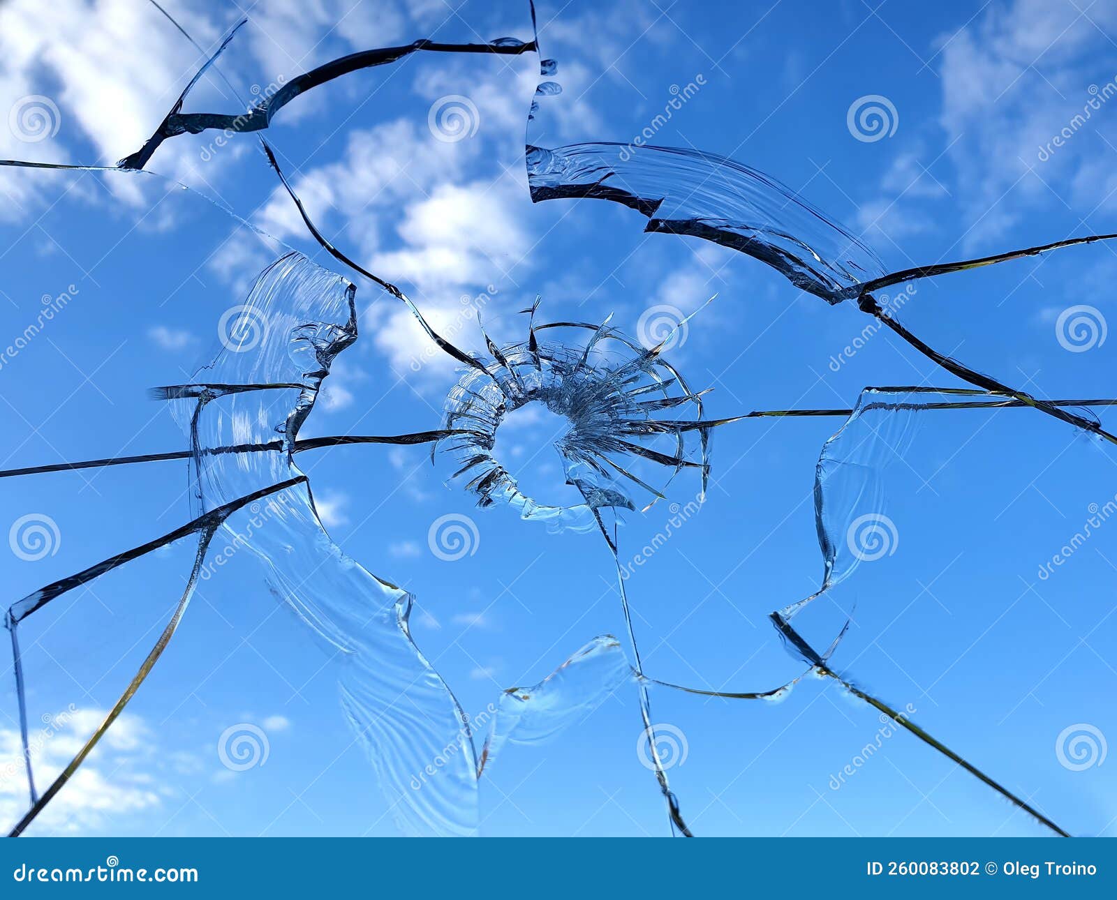 Broken Glass Window on Blue Sky Background Stock Photo - Image of crack ...