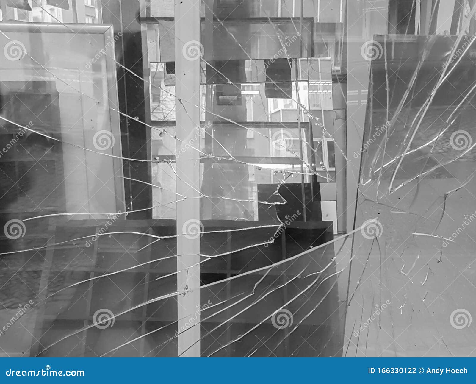 A Broken Glass of a Window with Many Glass Plates in the Background 库存 ...