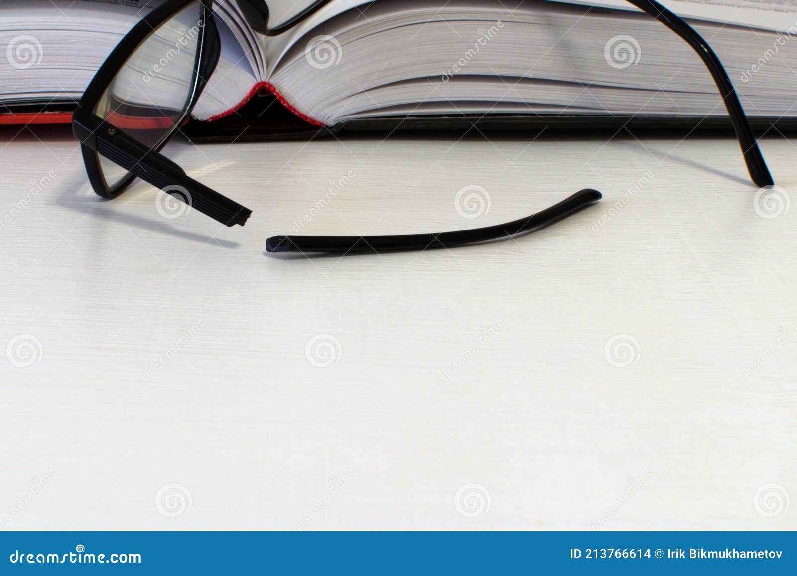 Broken Glasses on Open Book Stock Photo - Image of cheap, open: 213766614