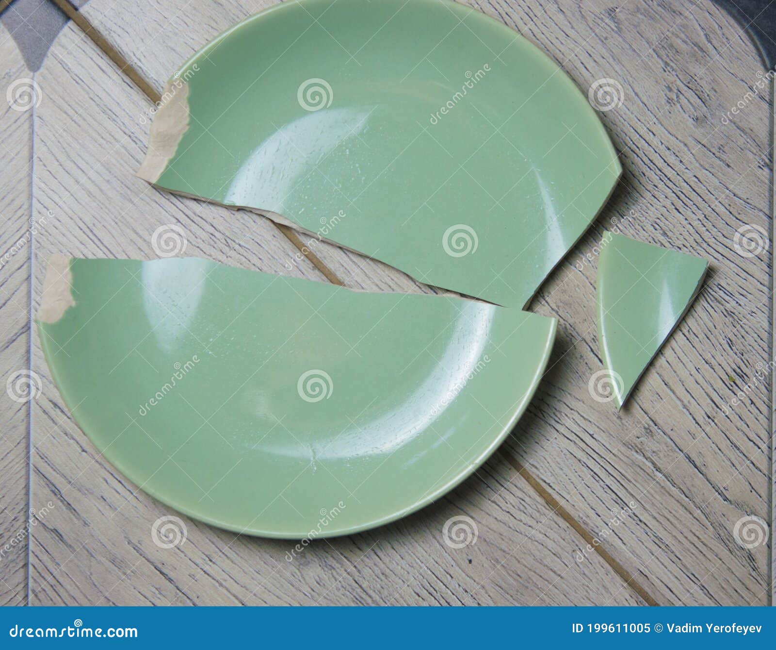 Broken Green Dish on Gray Floor Background Stock Image - Image of ...