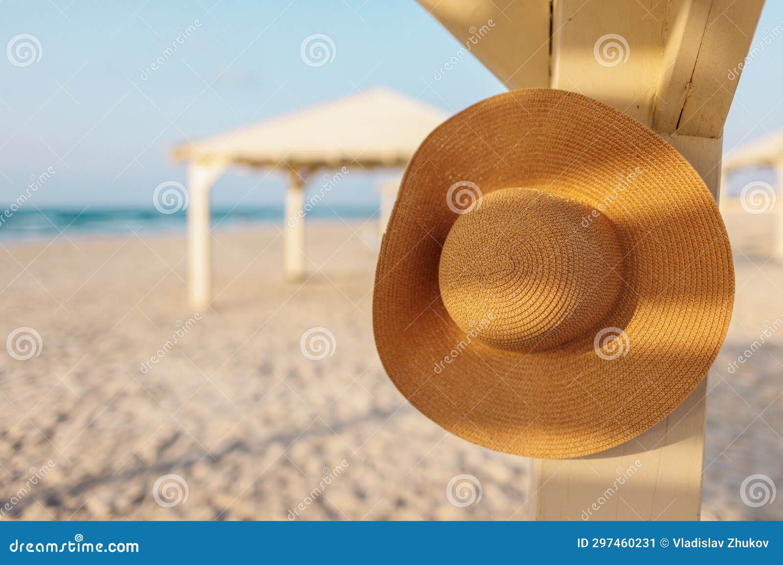 A Broken Hat Hangs on a Pole on the Beach Stock Image - Image of wear ...