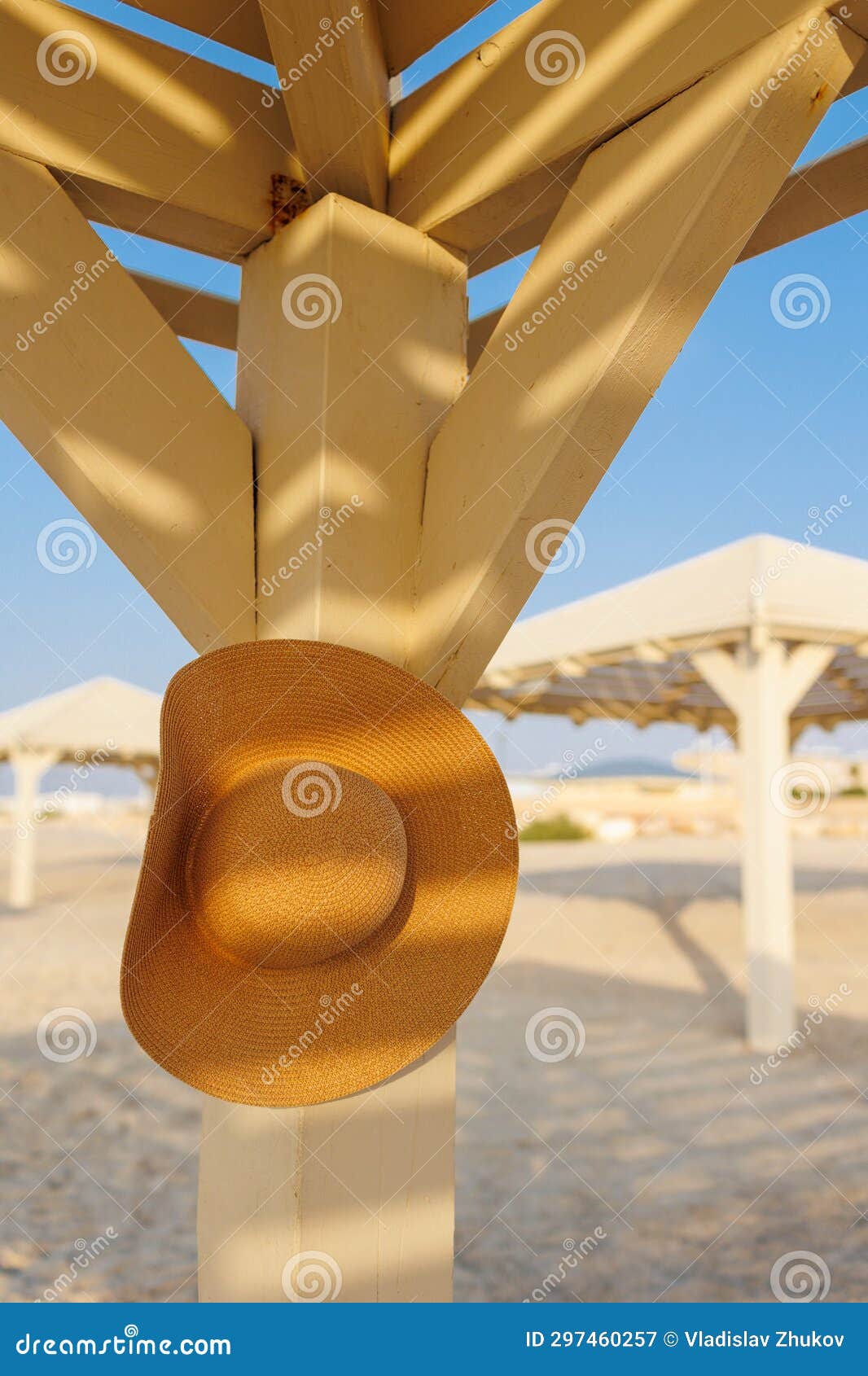A Broken Hat Hangs on a Pole on the Beach Stock Image - Image of brown ...