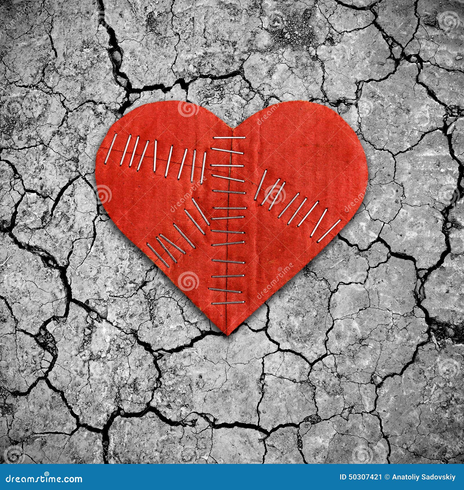 Broken heart on dry soil stock image. Image of grief - 50307421