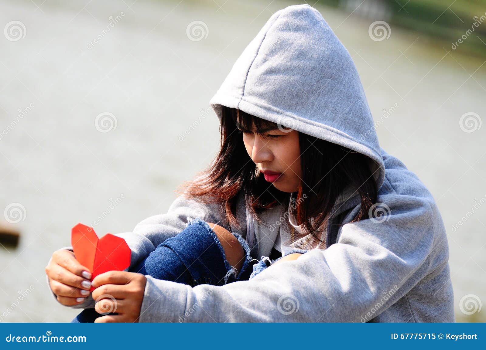 Broken Hearted Girl Seeing Red Paper Heart Stock Image - Image of ...