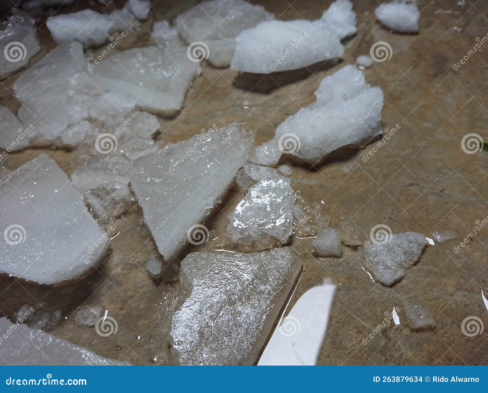 Broken ice on the floor stock photo. Image of dessert - 263879634
