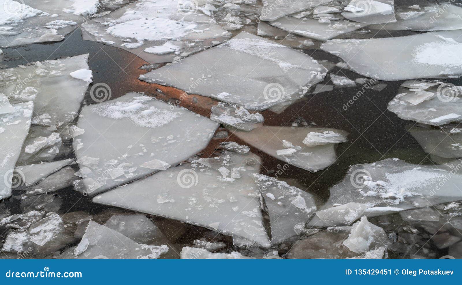 Broken Ice on a Winter River with Sunset Sky Reflection Stock Image ...