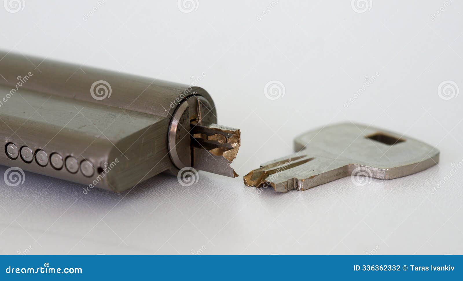 Broken key in the lock stock photo. Image of keyhole - 336362332