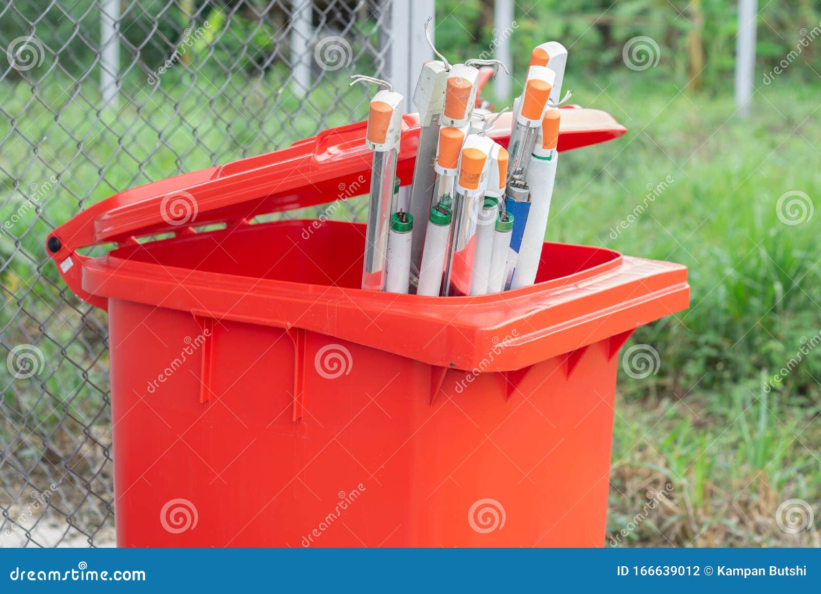 Dangerous Waste Material Dumped On The Urban City Street Near Garbage ...