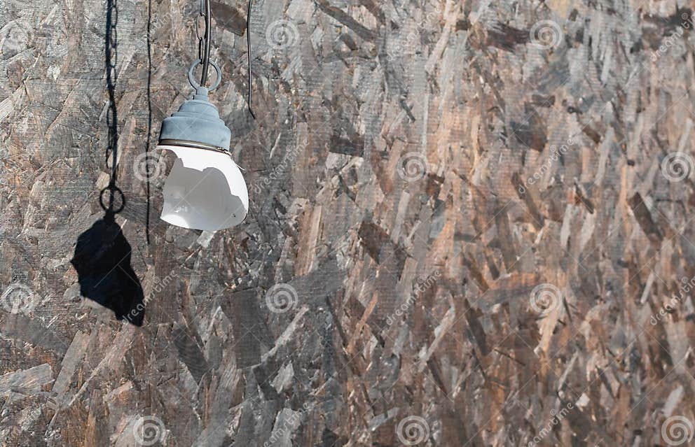 Broken Lantern with Shadow on Wall in Bright Sunlight Stock Image ...