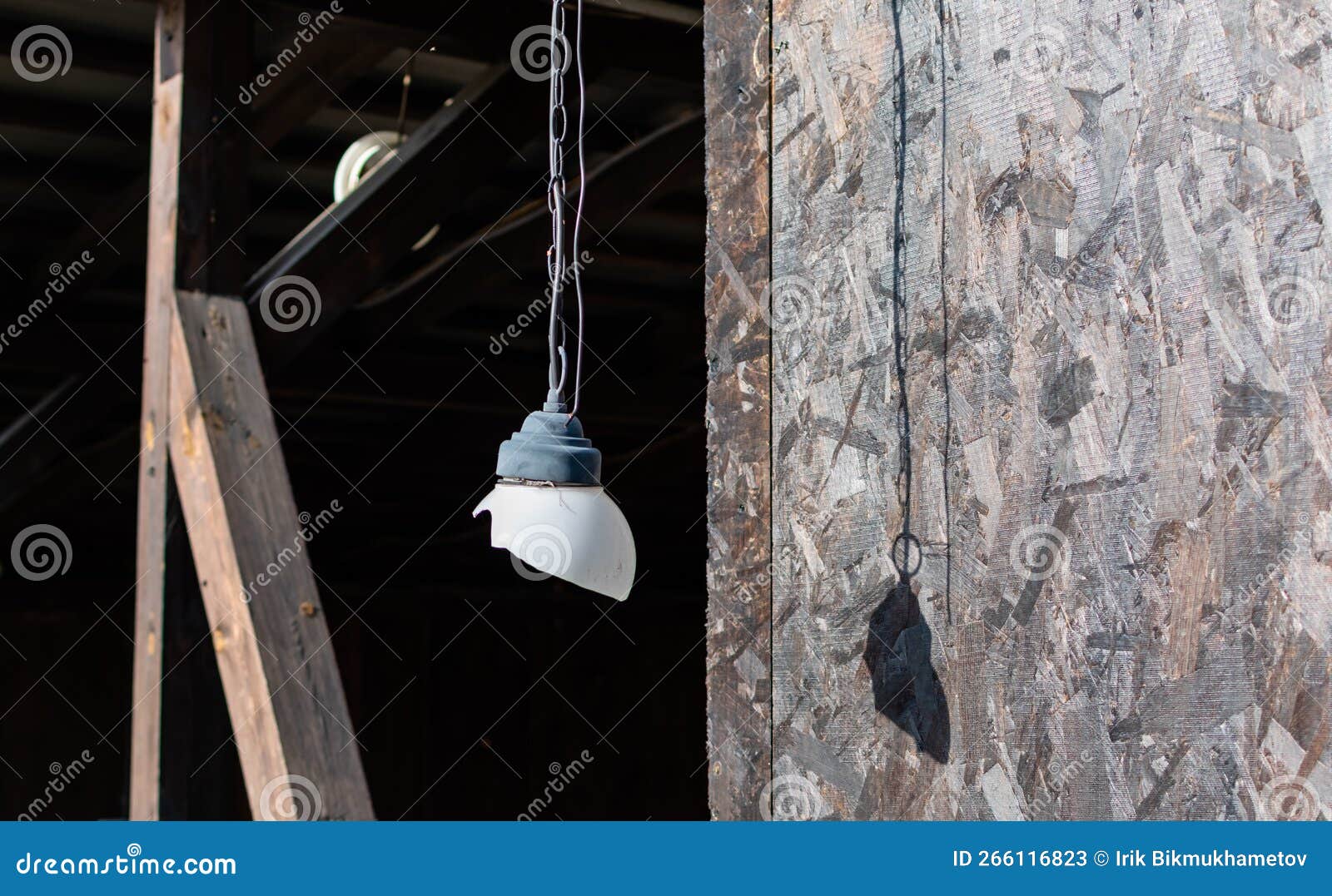 Broken Lantern with Shadow on Wall in Bright Sunlight Stock Image ...