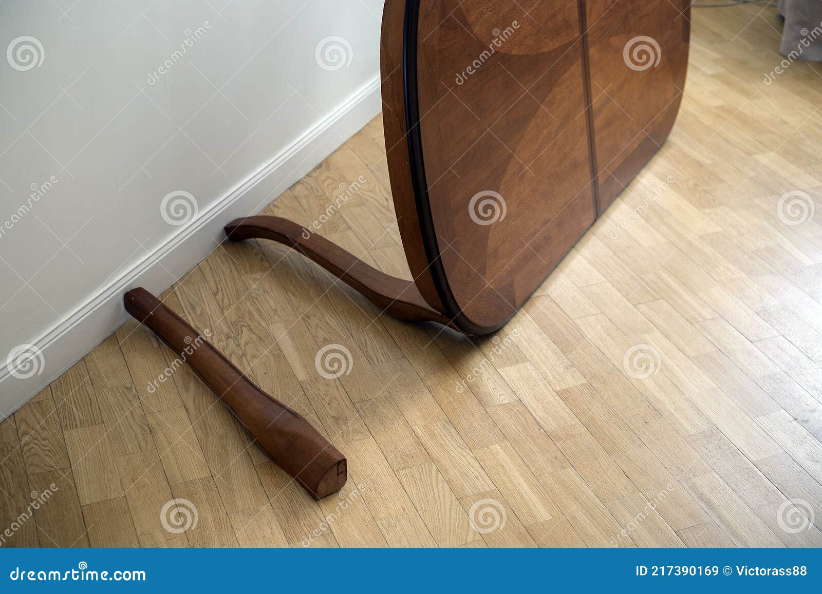 Broken leg of a table stock image. Image of broken, wall - 217390169