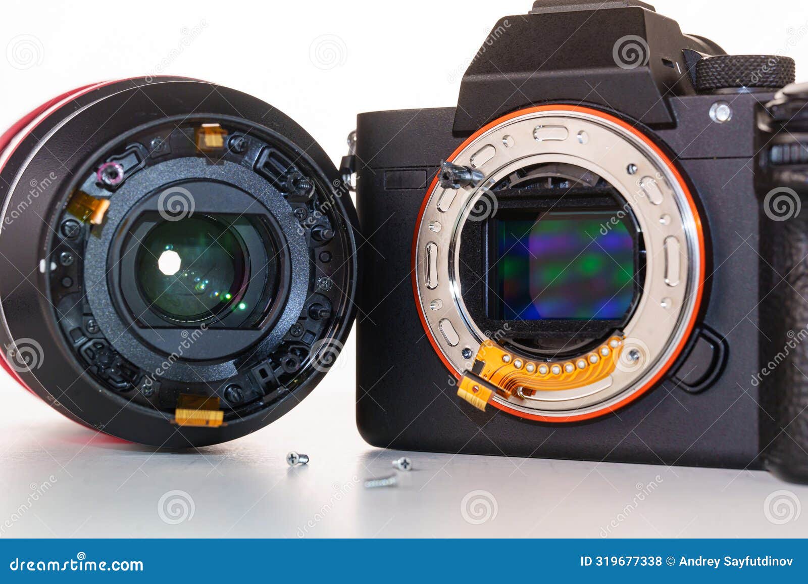 A Broken Lens, Professional Camera and Repair Tools on a White Table ...