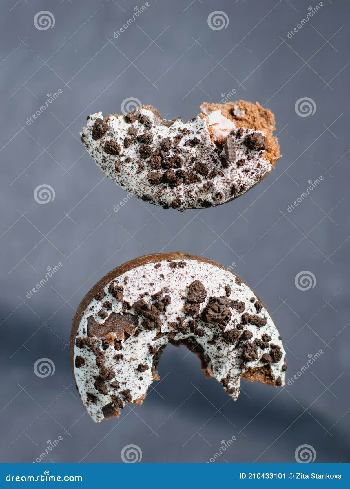 Broken Levitating Donut with Chocolate Pieces on a Grey Background ...