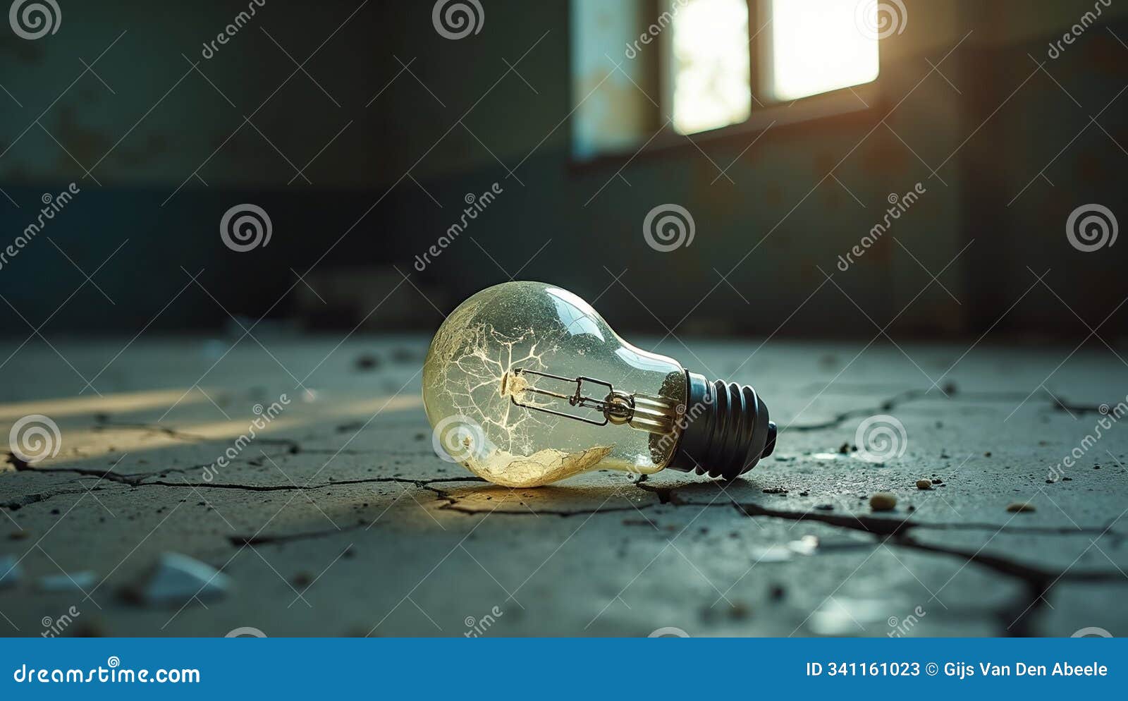 Broken Light Bulb on Cracked Floor in Abandoned Building Dust Particles ...