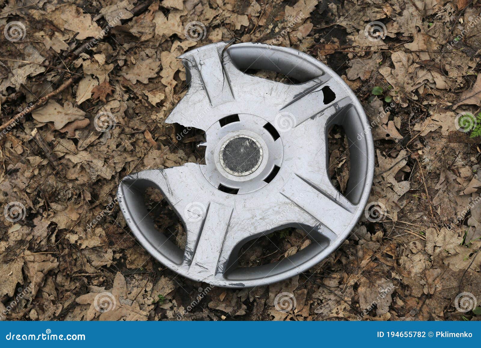 Broken and Lost Plastic Car Wheel Cap Stock Photo - Image of leafage ...