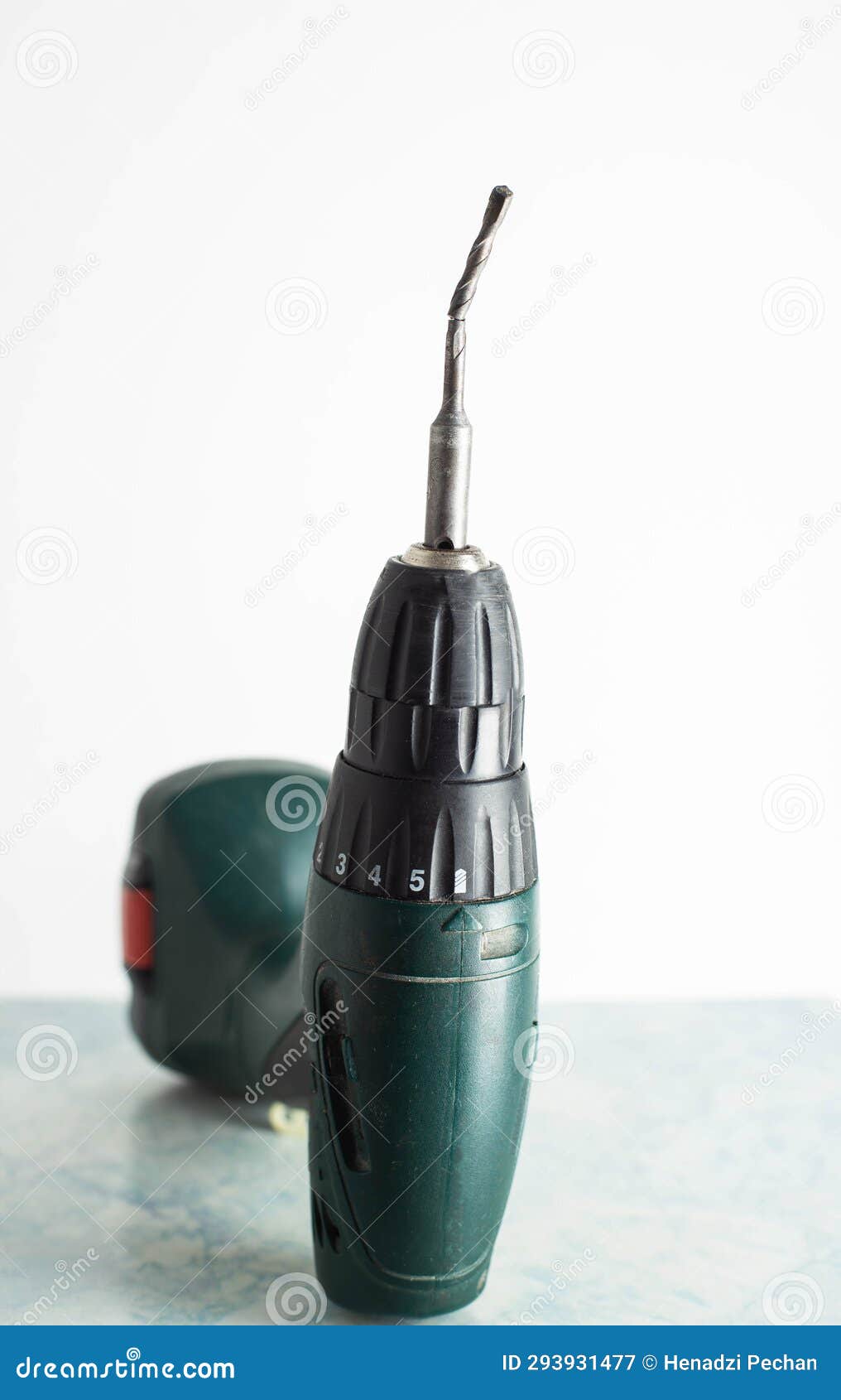 Broken Low-quality Drill in a Screwdriver on a White Background ...