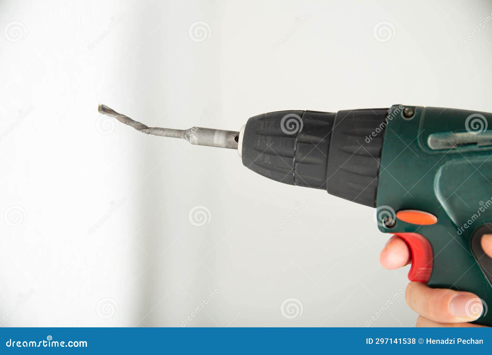 Broken Low-quality Drill in a Screwdriver on a White Background ...