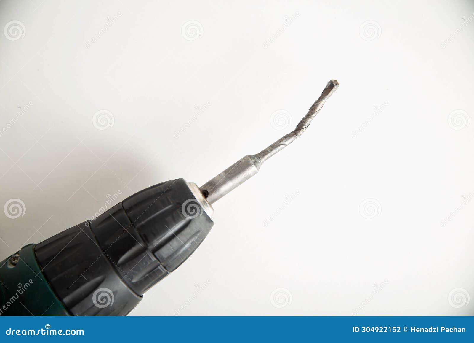 Broken Low-quality Drill in a Screwdriver on a White Background ...