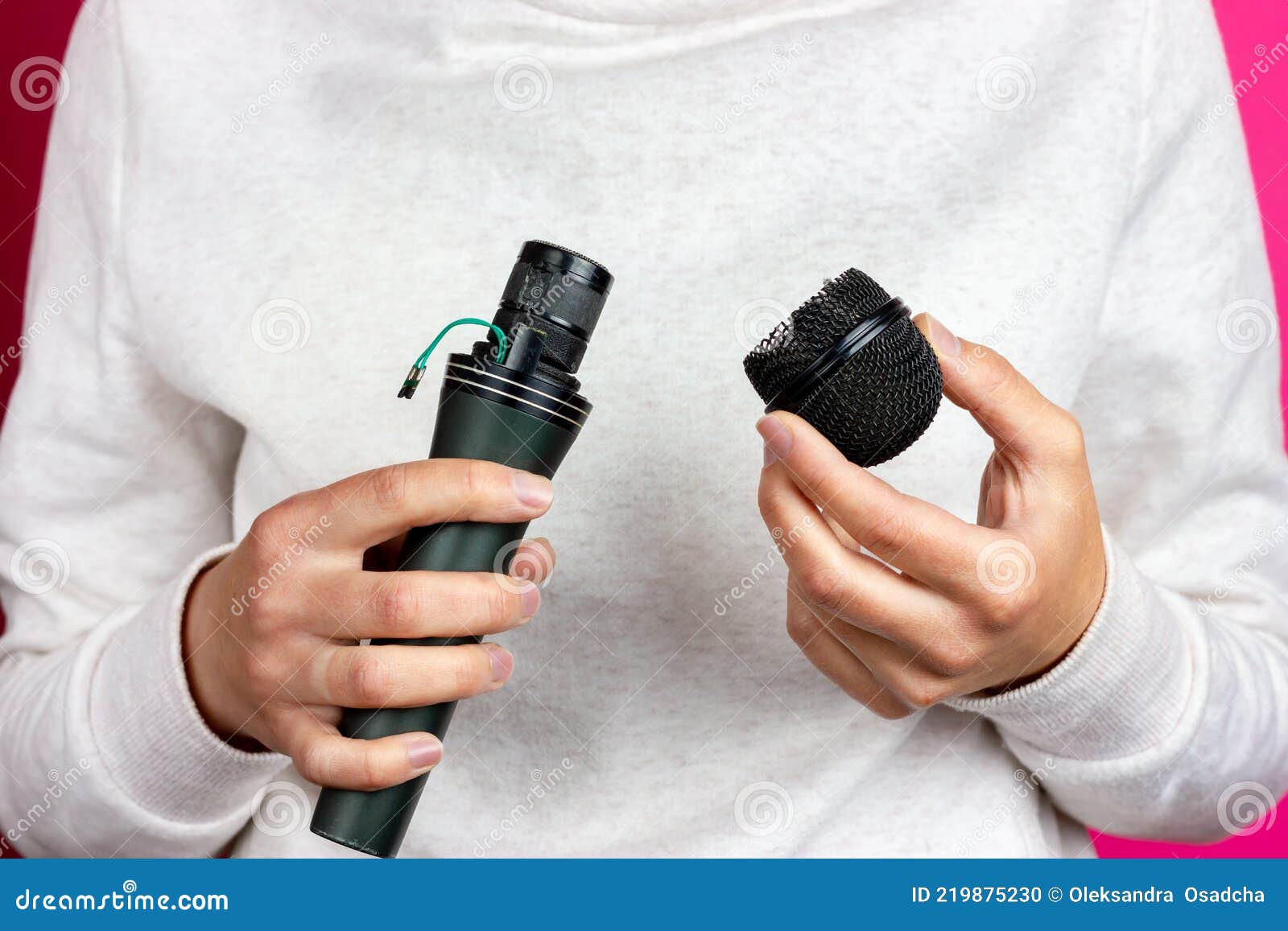 Broken Microphone in Hand. Broken Mesh Microphone Stock Photo - Image ...