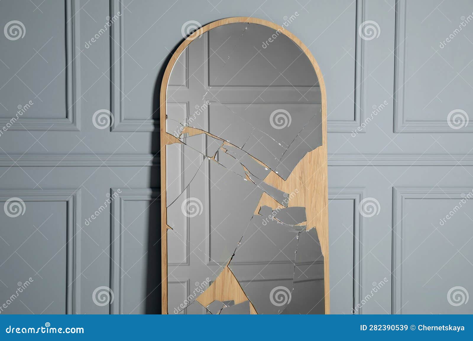 Broken Mirror with Many Cracks Near Grey Wall Stock Image - Image of ...