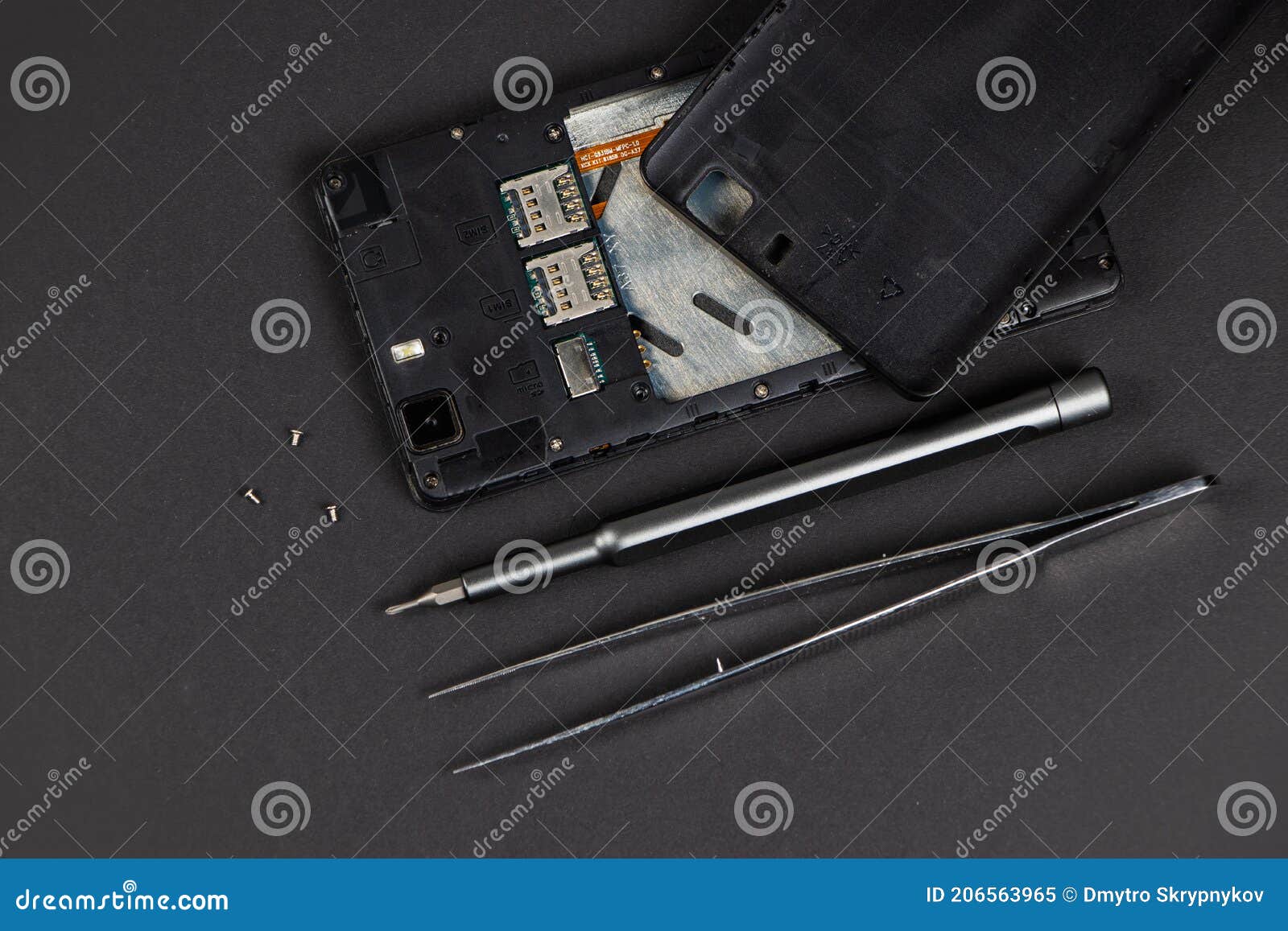 Broken Mobile Phone and Repair Tools on Dark Background, Flat Lay Stock ...