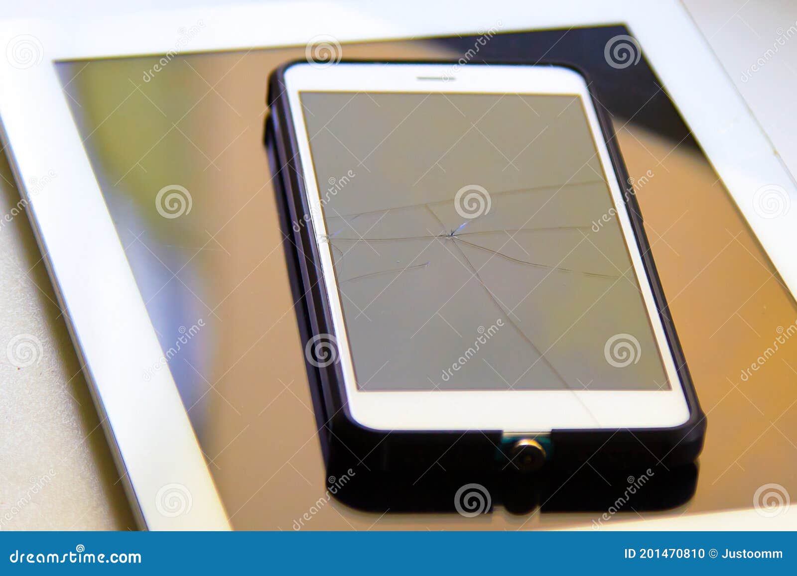 Colored Highlights of a Broken Mobile Phone Screen in the Reflection of ...