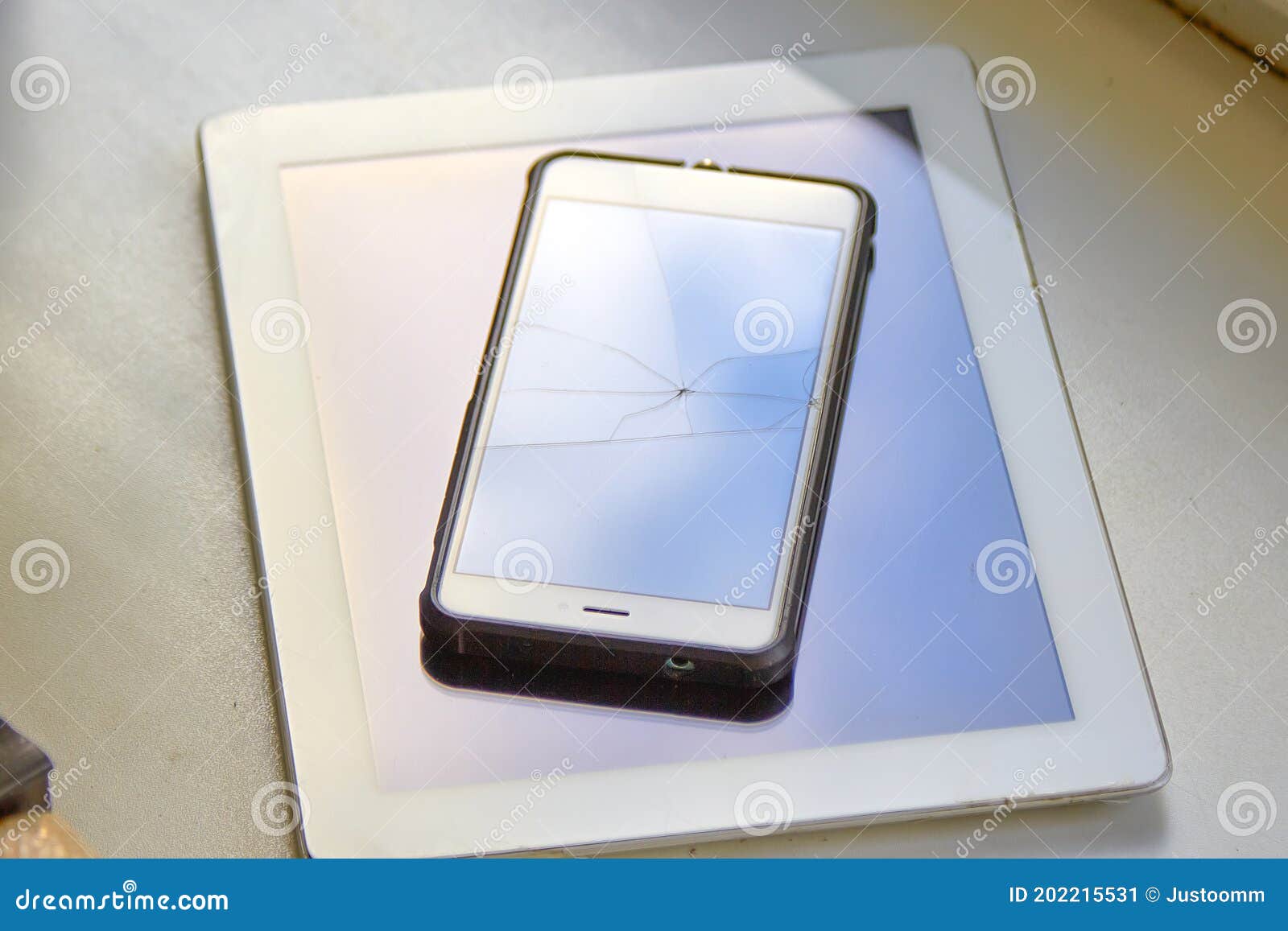 Colored Highlights of a Broken Mobile Phone Screen in the Reflection of ...