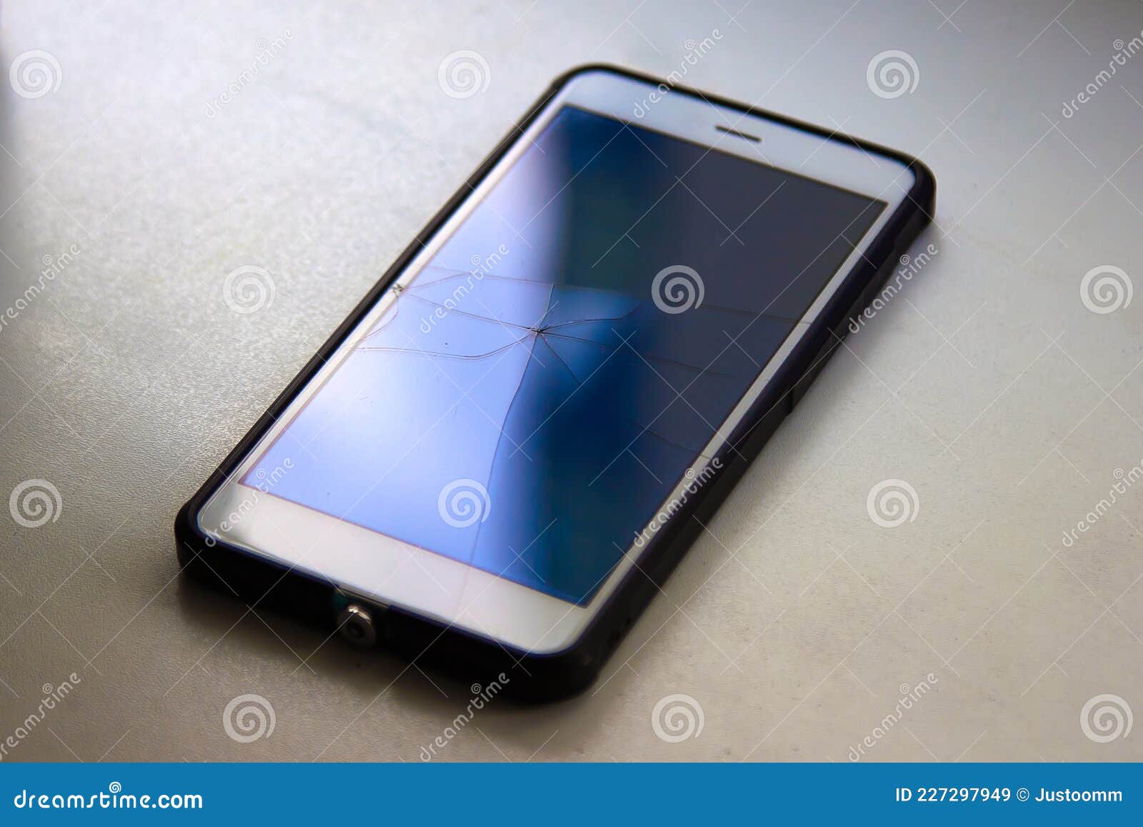 Colored Highlights of a Broken Mobile Phone Screen in the Reflection of ...