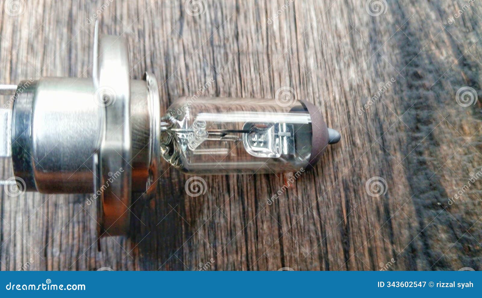 A Broken Motorcycle Headlight Bulb Shows a Broken and Blackened ...