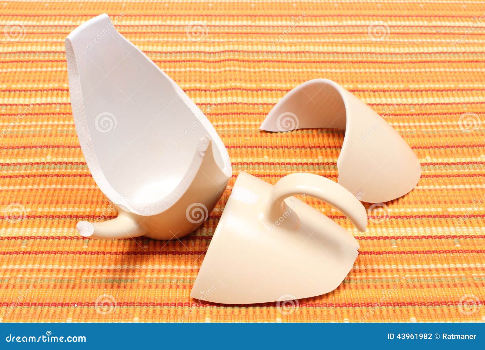 Broken Mug, Shattered Cup on Orange Cloth Stock Photo - Image of broken ...