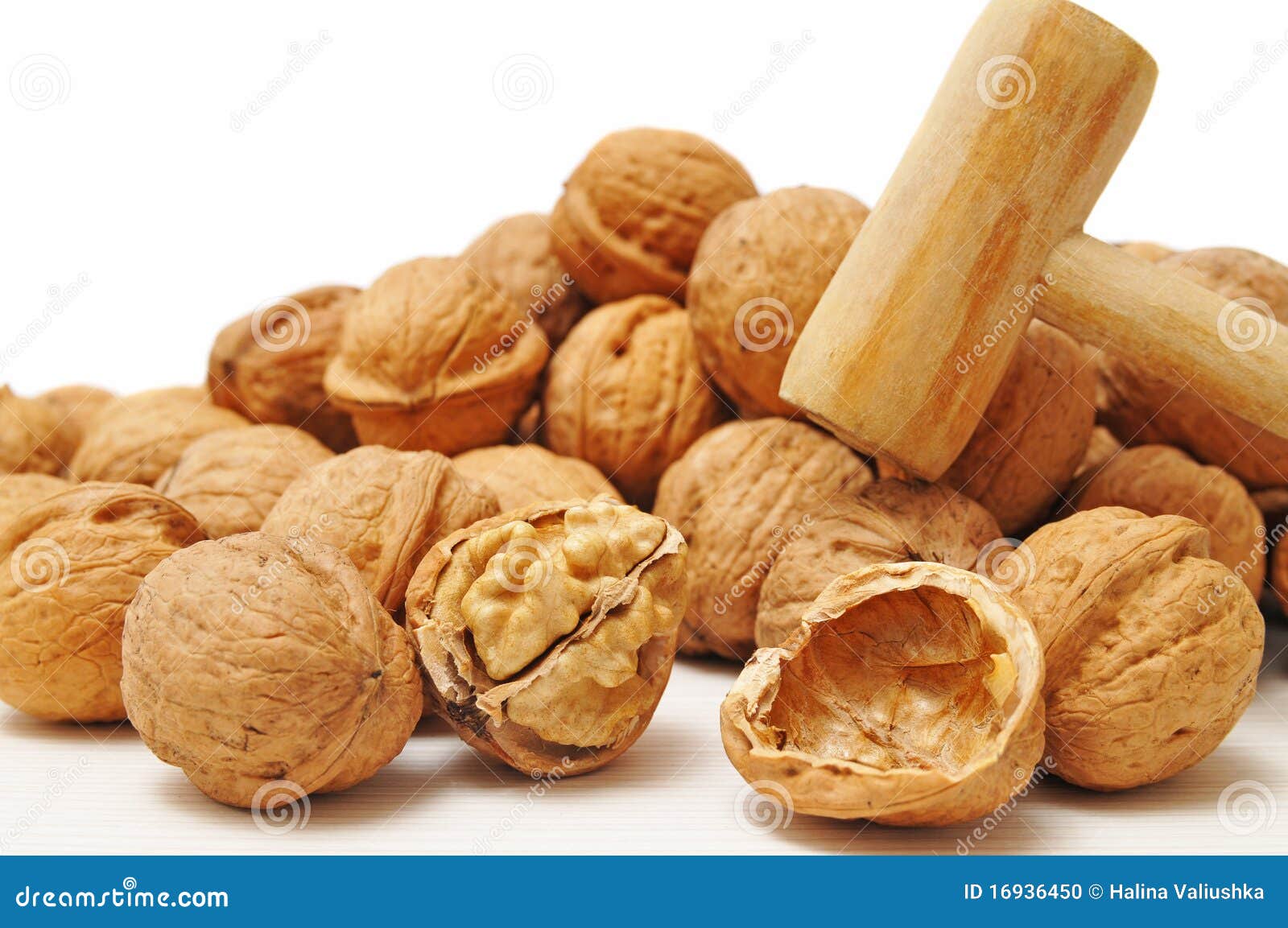 Broken nuts and mallet stock photo. Image of broken, health - 16936450